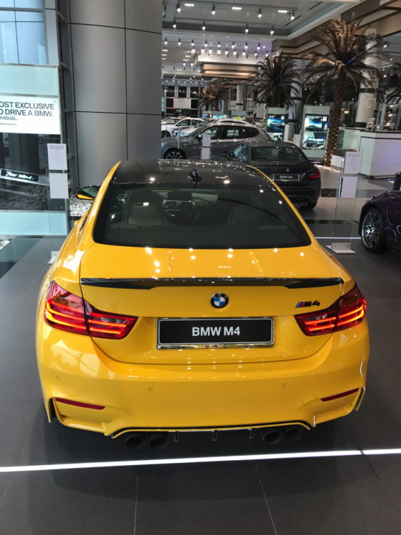 Speed Yellow BMW M4 in Abu Dhabi Dealership - BMW.SG | BMW Singapore ...
